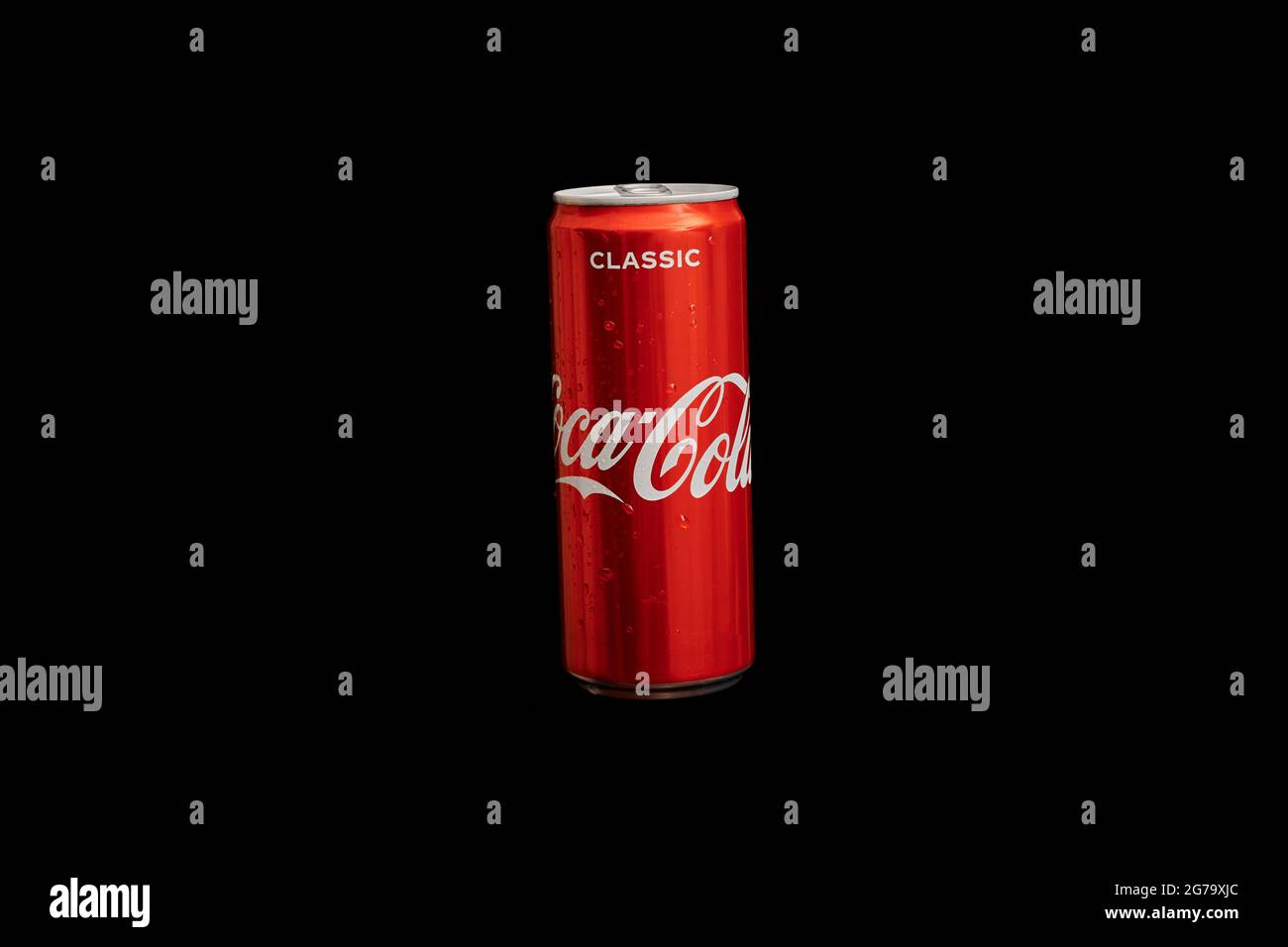 KALININGRAD, RUSSIA - MARCH 13, 2021 - Coca Cola can, black background ...