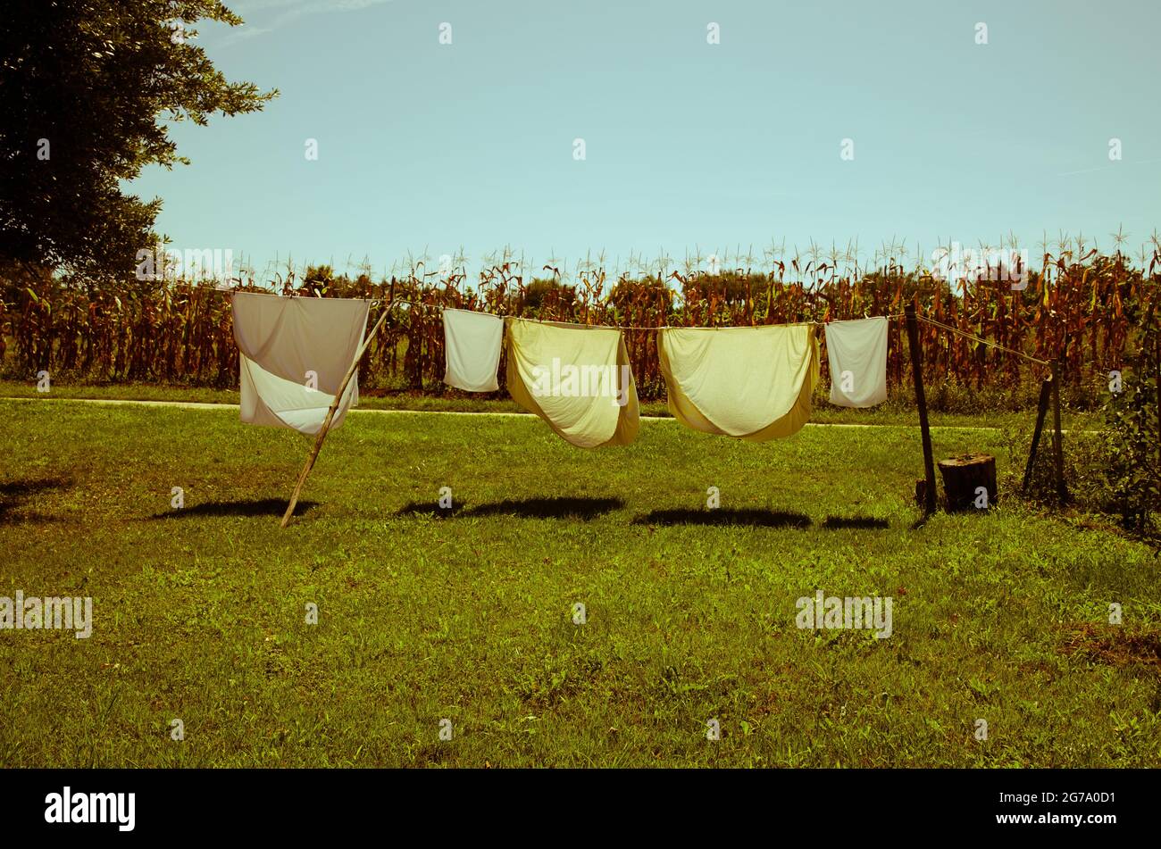 white drying clothes in washing line outdoor Stock Photo - Alamy