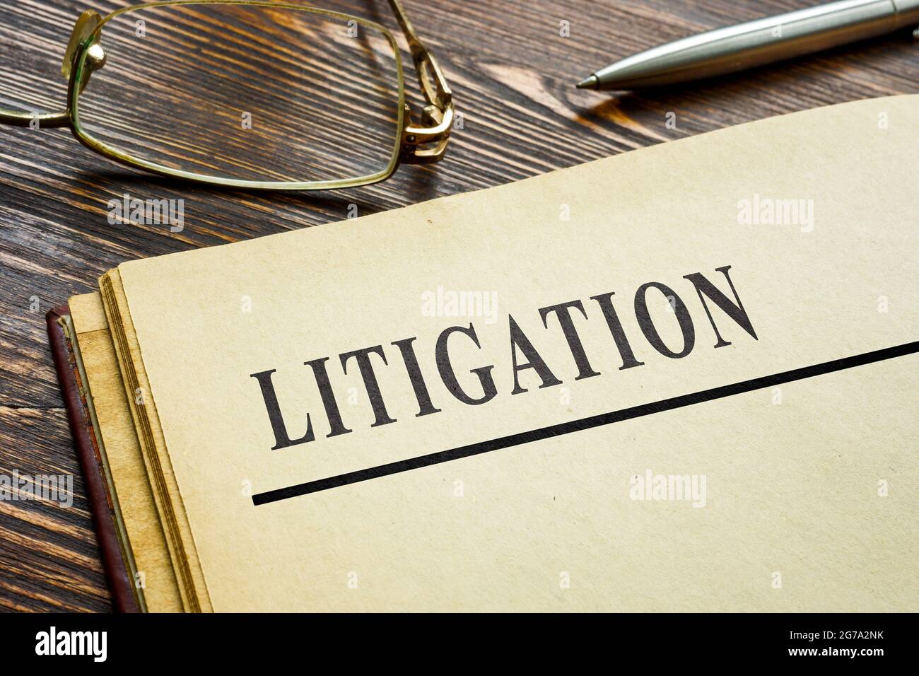 Old book with litigation word on the page Stock Photo - Alamy