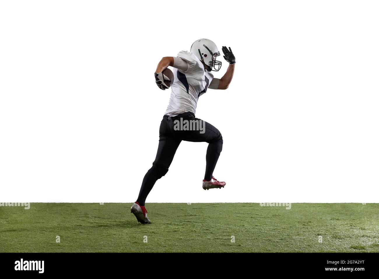 American football player isolated on white studio background. Back view ...