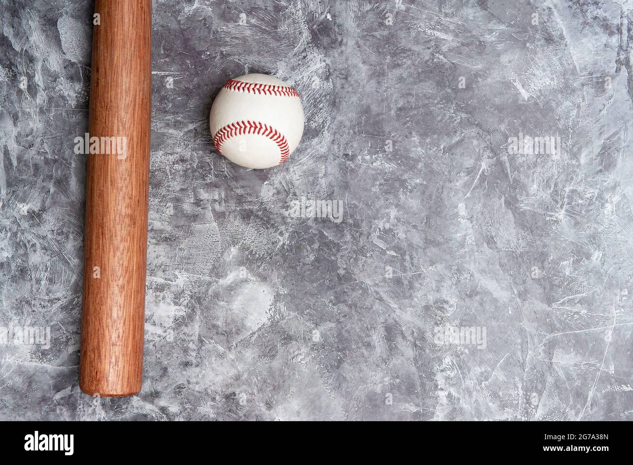 Baseball ball and bat on grey background. Team sport concept Stock ...