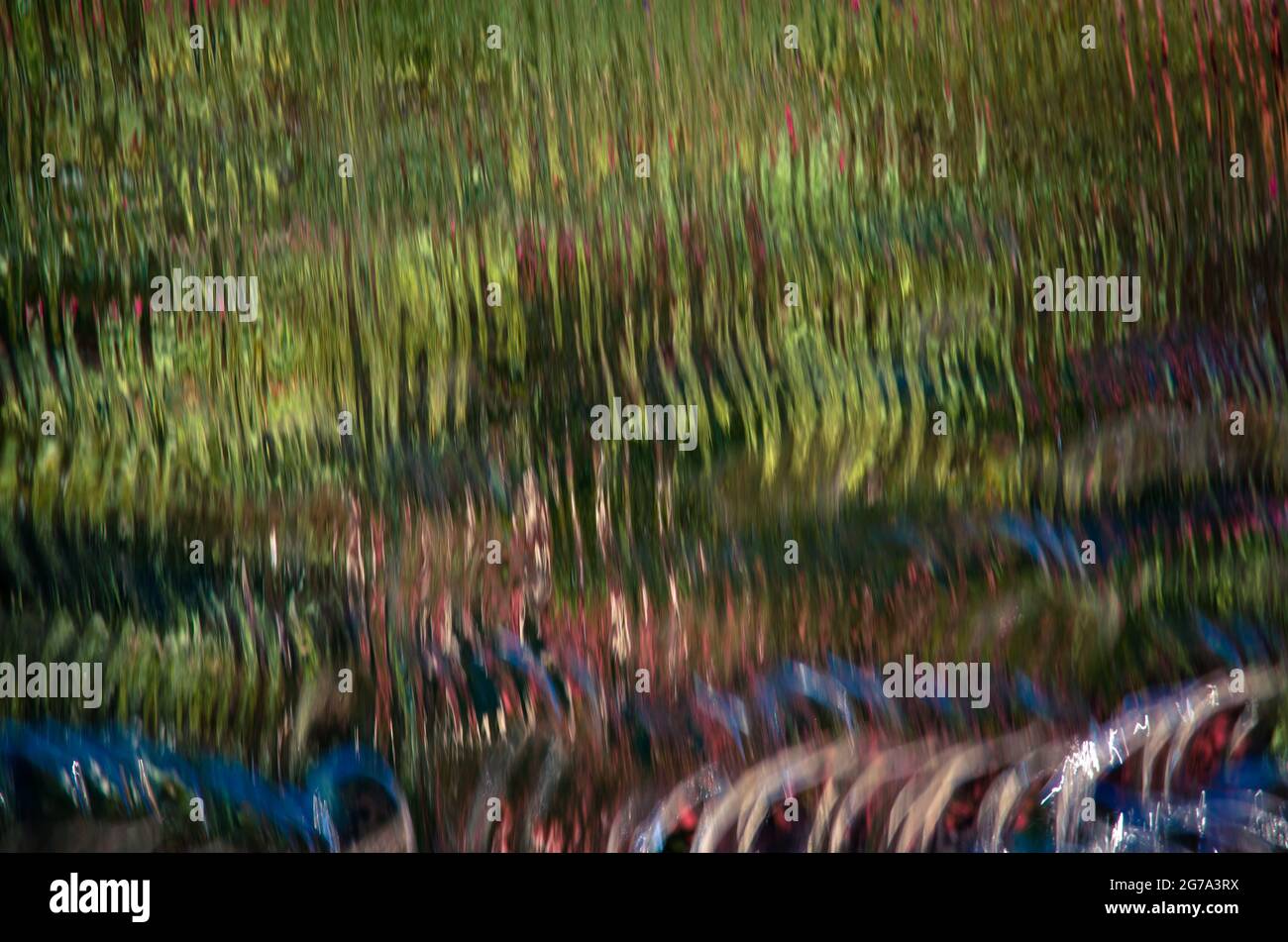 falling water structure in green color Stock Photo - Alamy