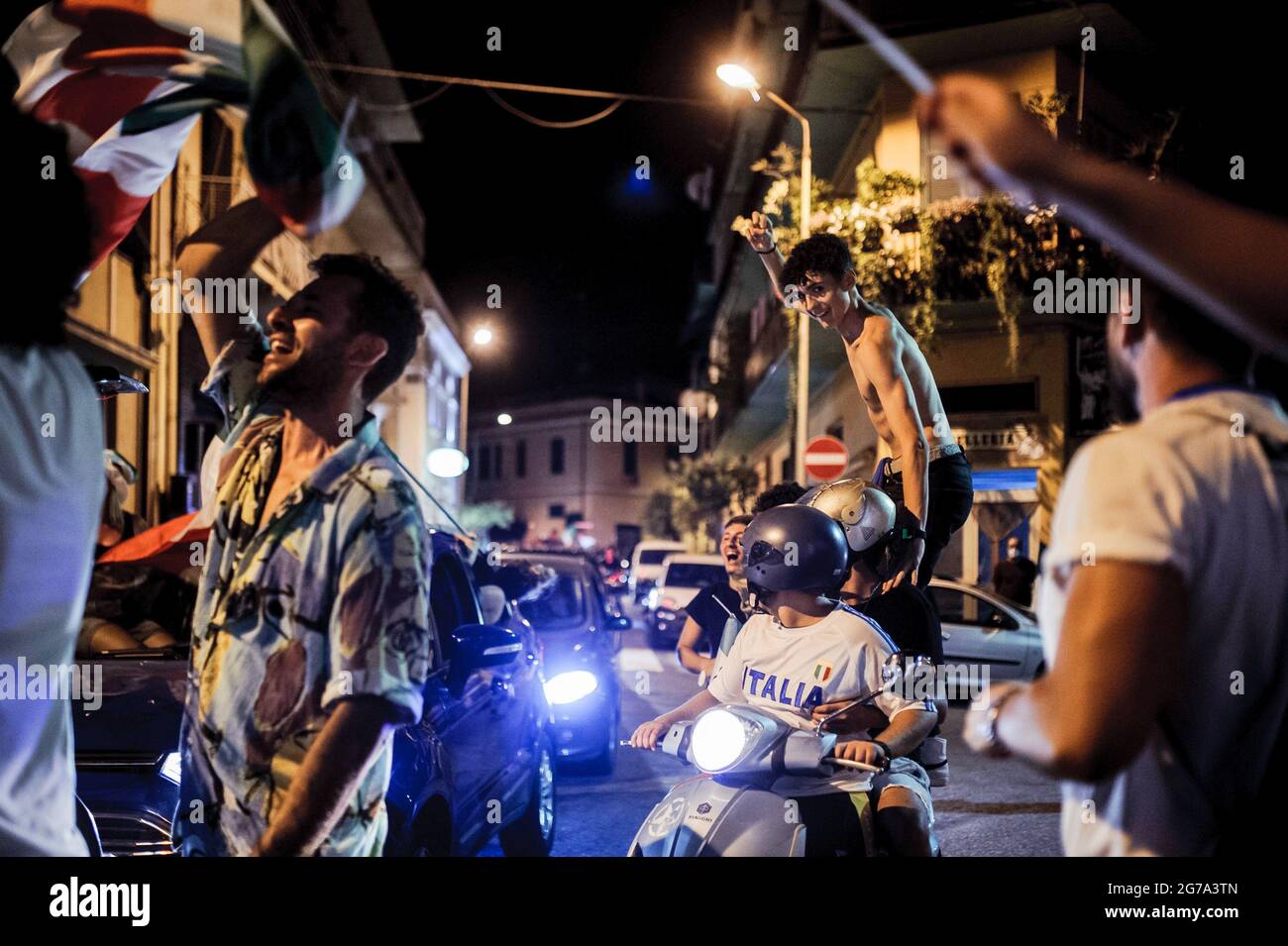 Tropea, Italy. 12th July, 2021. Jubilant Italian fans celebrate victory ...