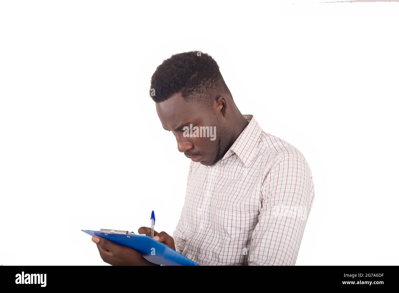 busy manager takes notes in the notebook for booking and shipping ...