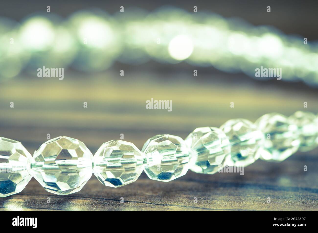 detail of white transparent shining beads Stock Photo - Alamy