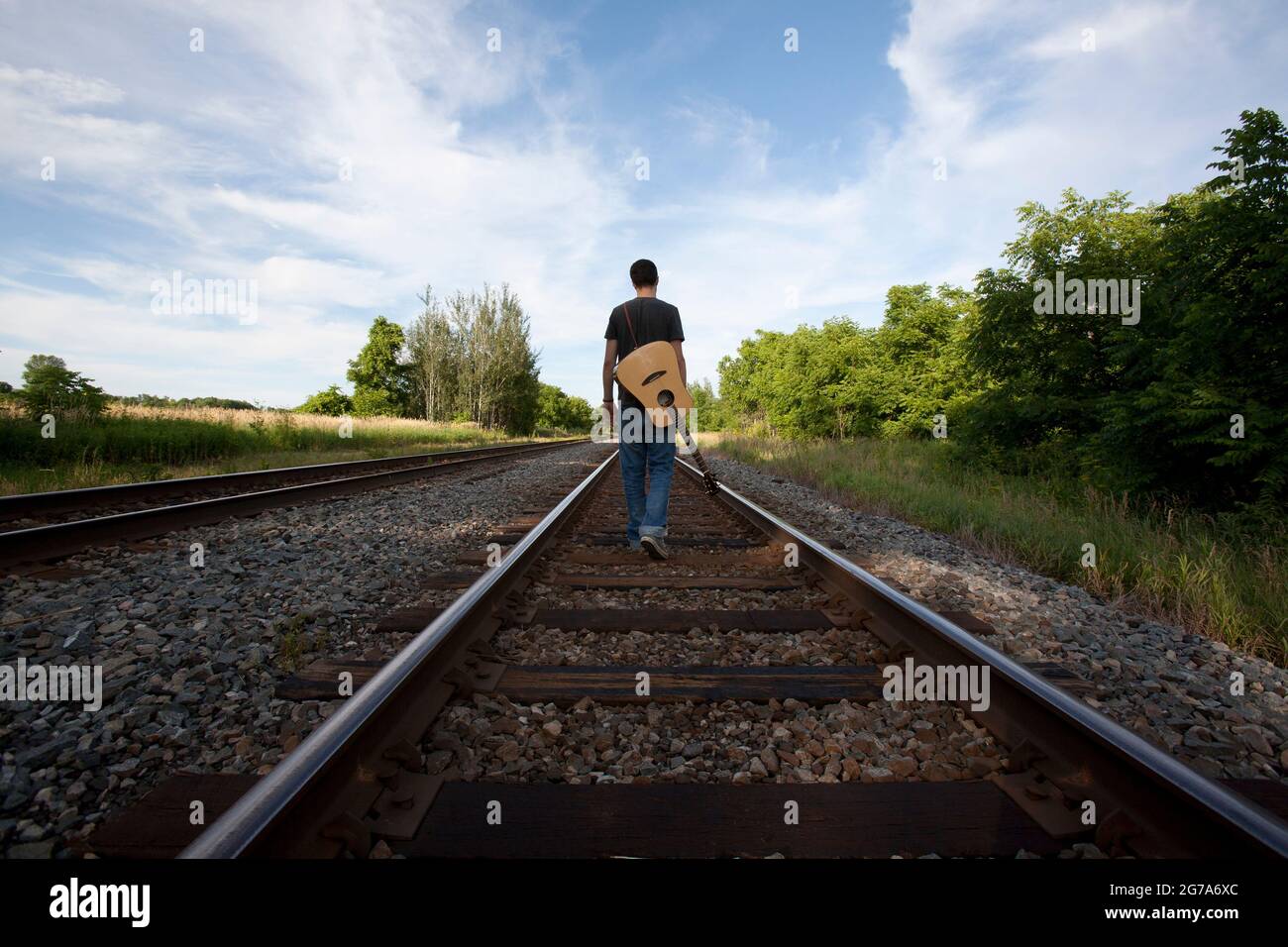 Boy walking train tracks hi-res stock photography and images - Alamy
