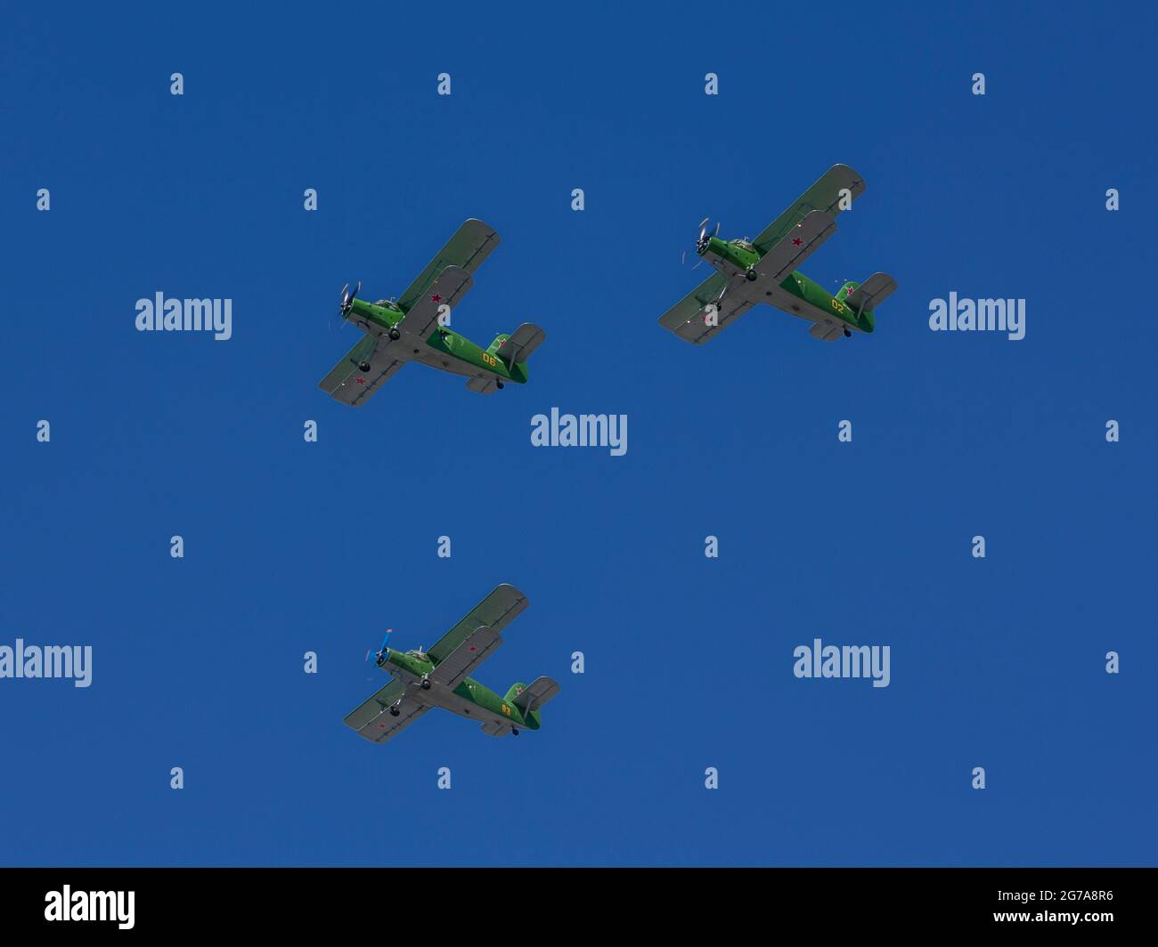 Omsk, Russia. 24 June, 2020. A triple unit of small aircraft consisting ...