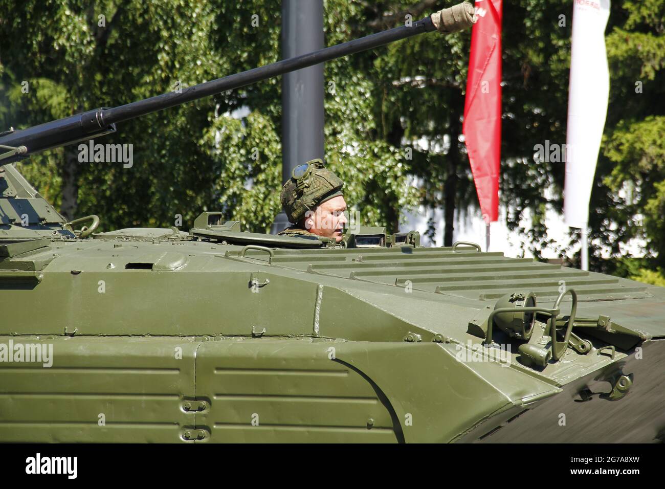 Omsk, Russia. 24 June, 2020. The trooper looks out of the hatch of the ...