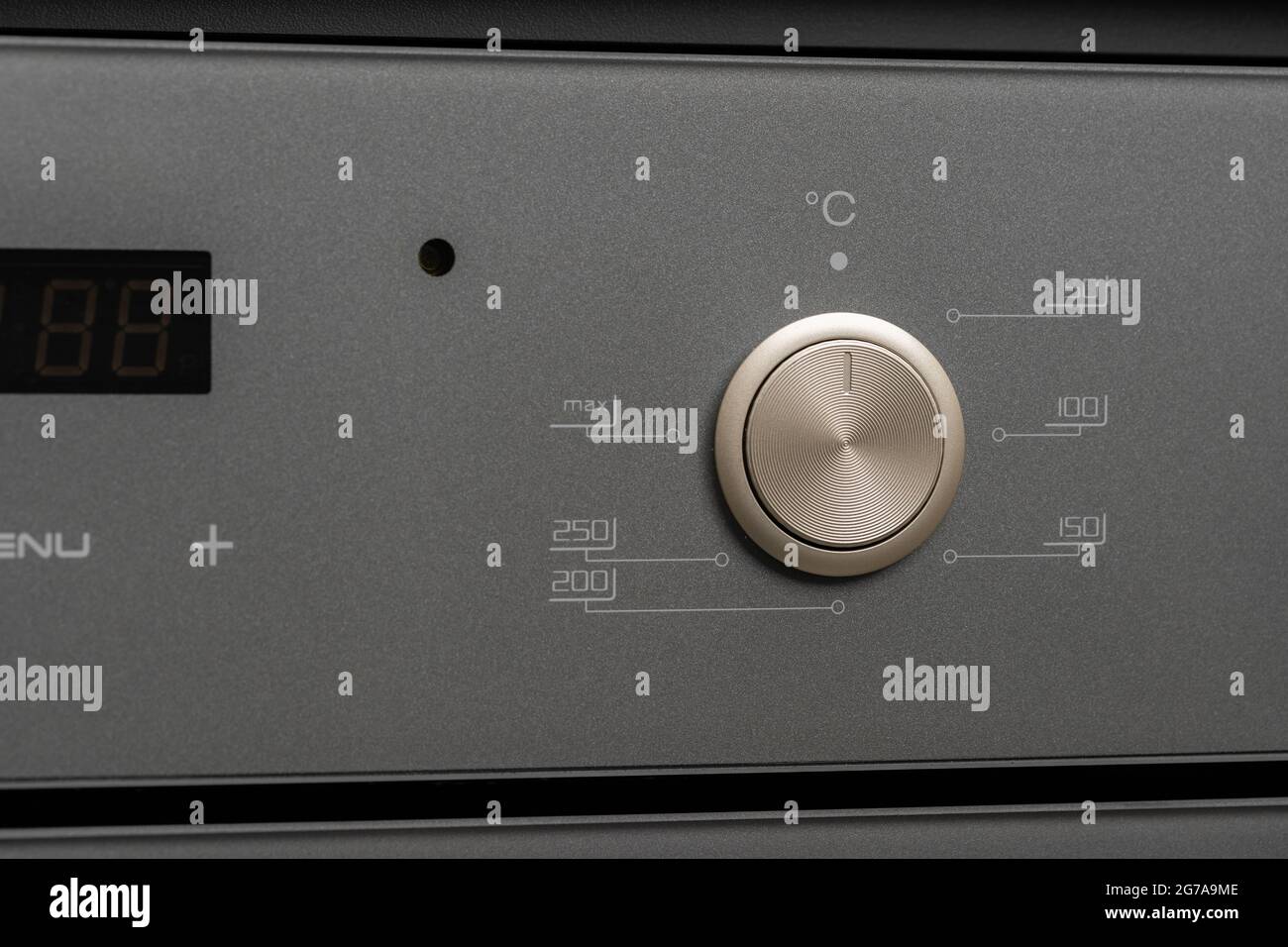 Modern oven mode control button close up Stock Photo - Alamy
