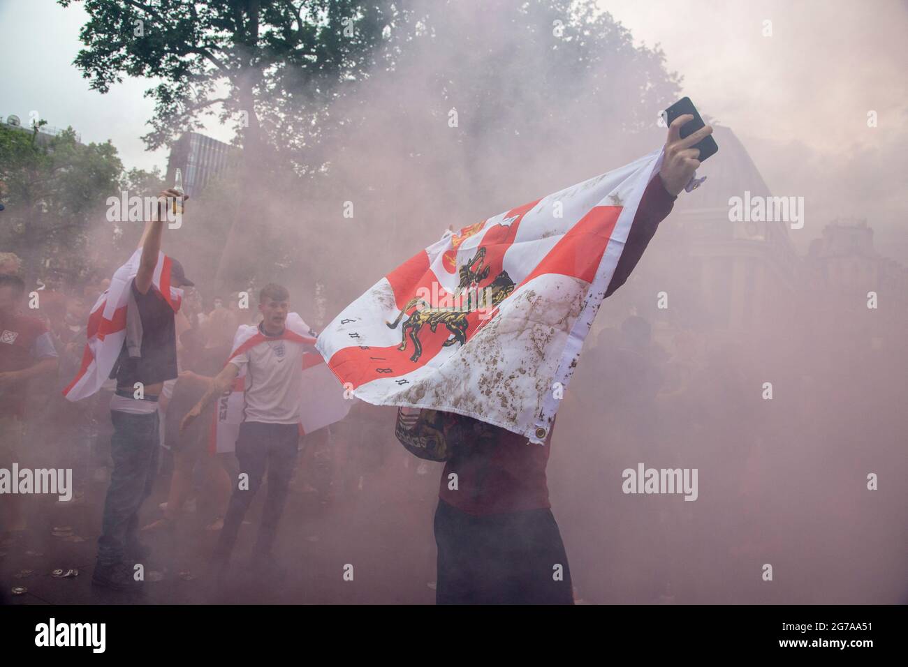 Fans dancing in pink smoke from smoke flares ahead of the Euro 2020 ...