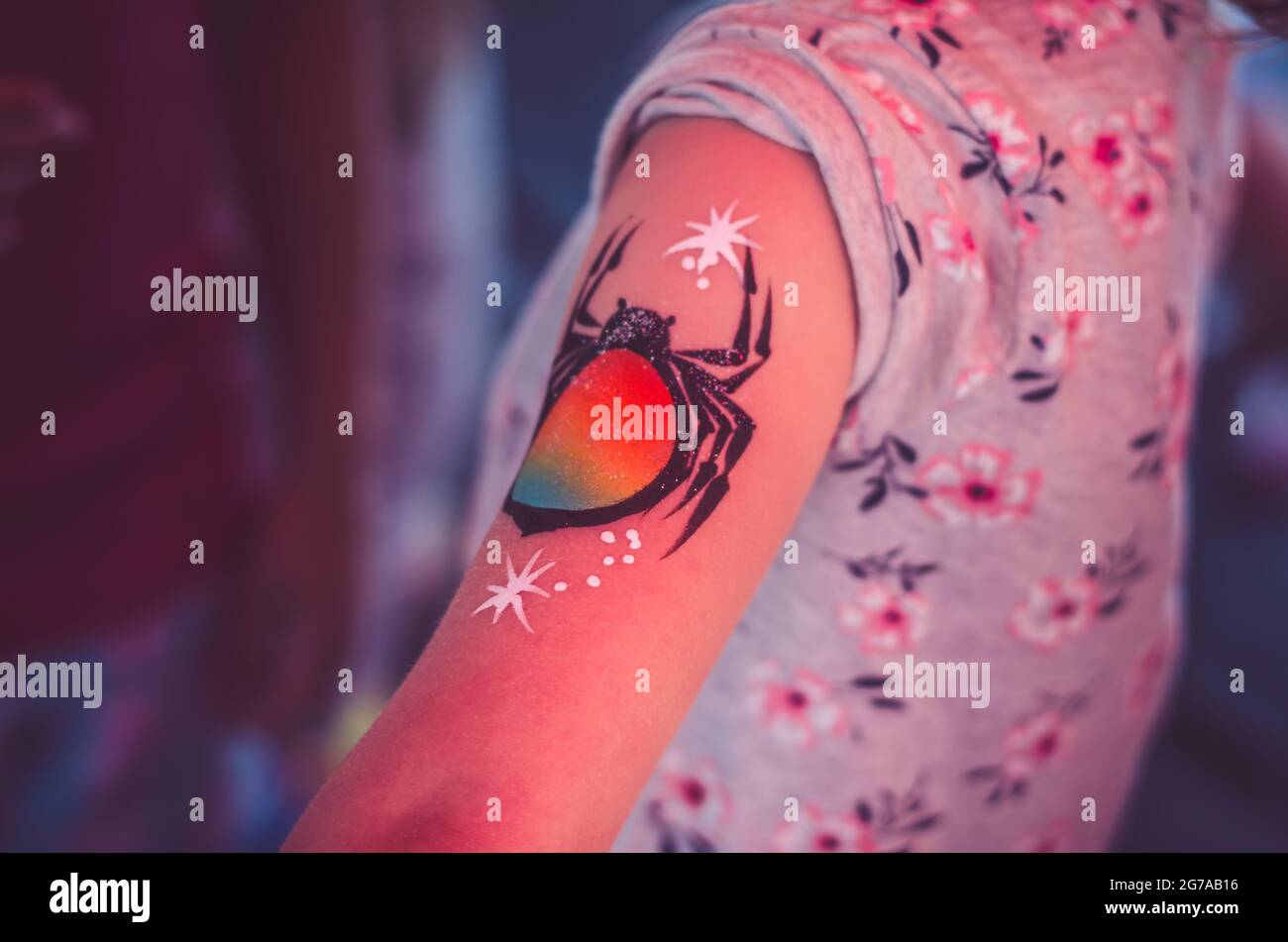 colorful spider painting in hand Stock Photo - Alamy
