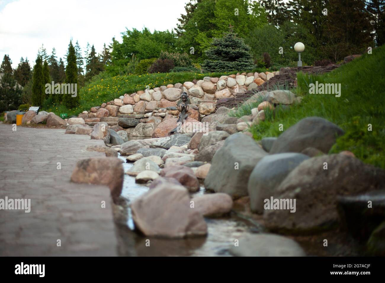 Park with stones. Resting place in summer. Landscaping Stock Photo - Alamy