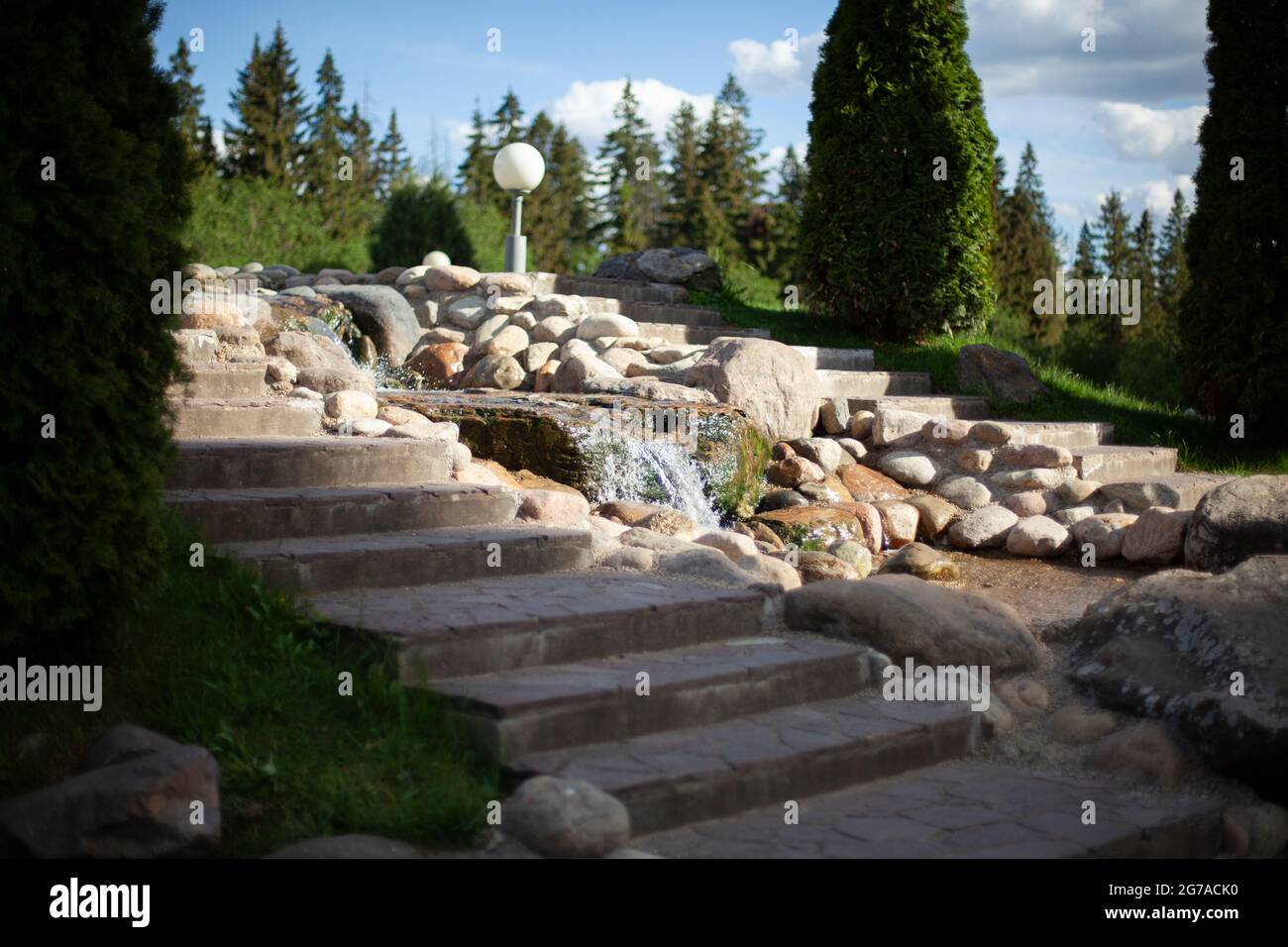 Park with stones. Resting place in summer. Landscaping Stock Photo - Alamy