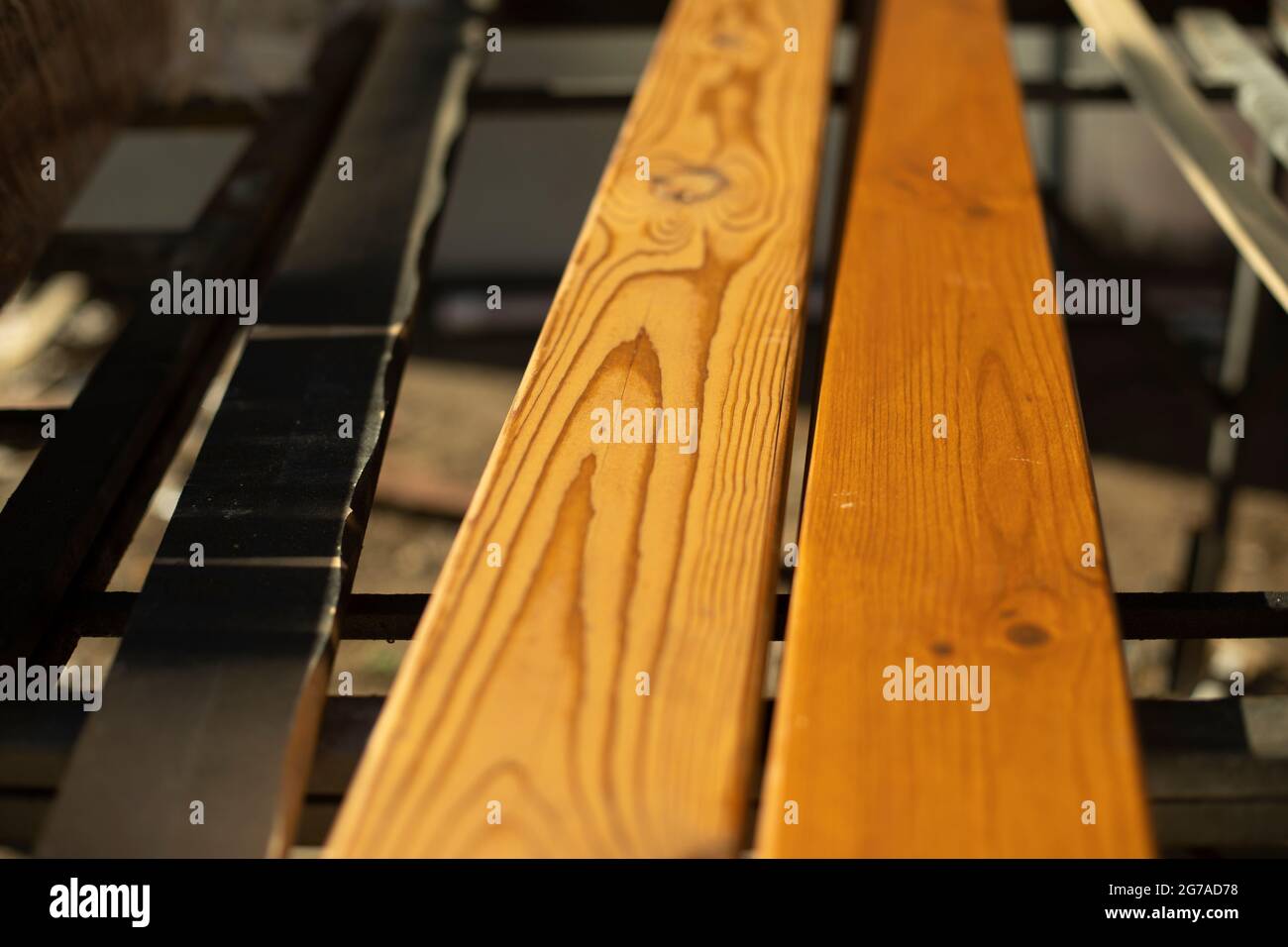 Planks in a woodworking workshop. The boards are ready for work. Lumber ...