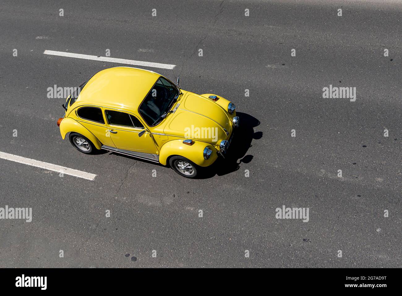 Ankara, Turkey - June 15 2021: Top view of yellow beetle car driving on divided road Stock Photo ...