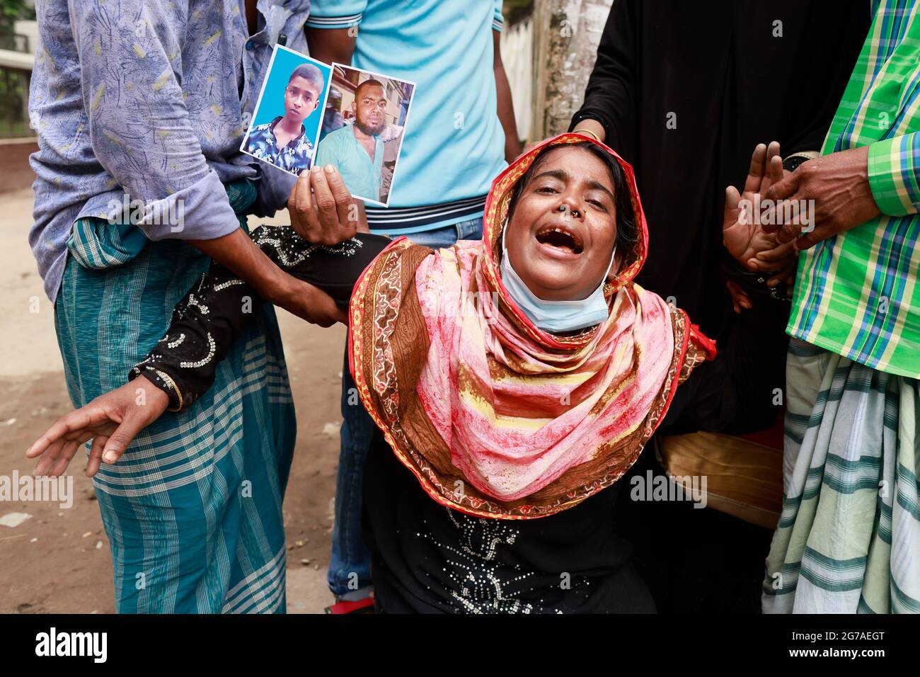 Dhaka, Bangladesh. 12th July, 2021. Nazma Begum, mother of 12-year-old ...