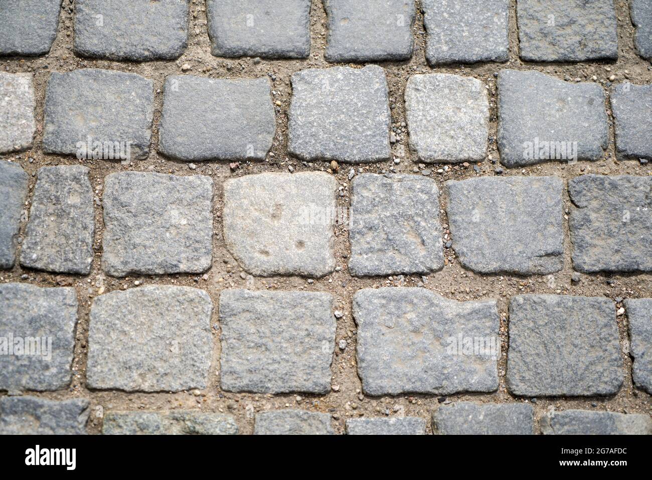 Structure of a stone as a pavement slab or as a brick Stock Photo - Alamy