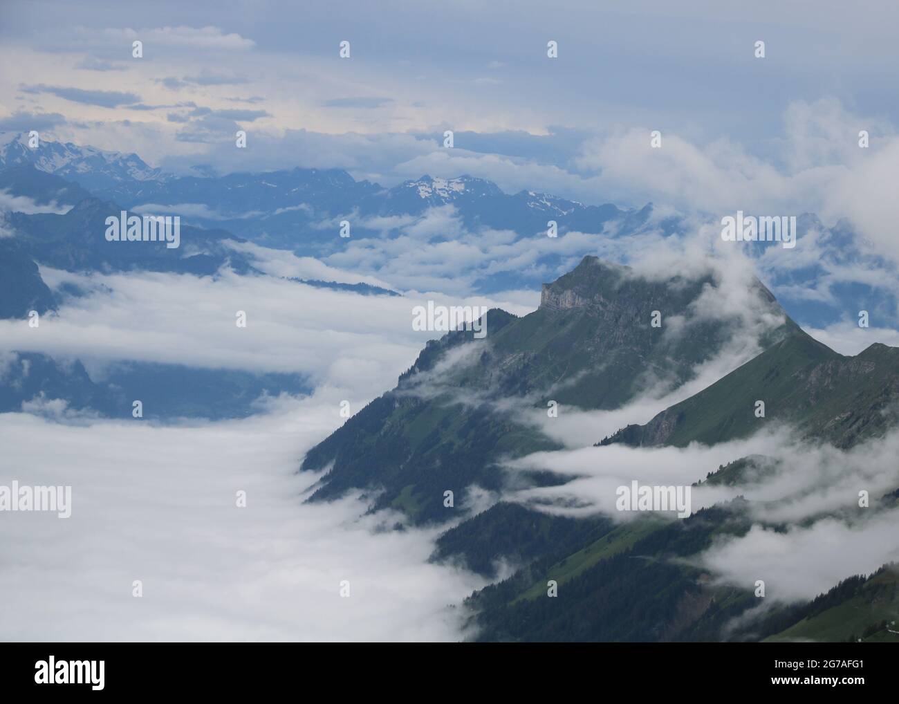 Augstmatthorn seen from Brienzer Rothorn. Mountain near Interlaken. Fog ...
