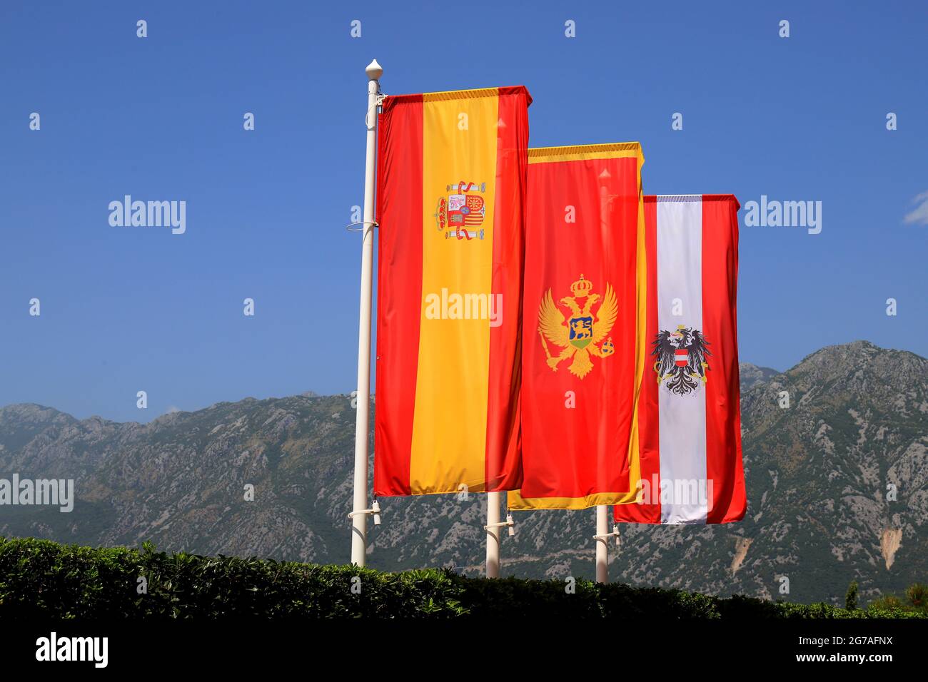 Flags with the coats of arms of Montenegro, Austria, Spain are flying ...