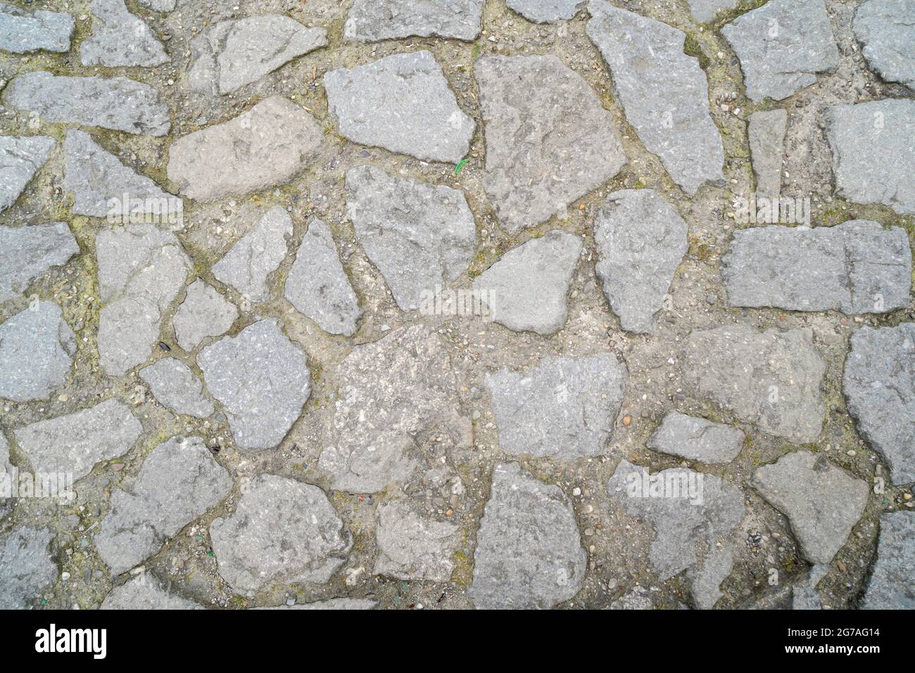 Structure of a stone as a pavement slab or as a brick Stock Photo - Alamy