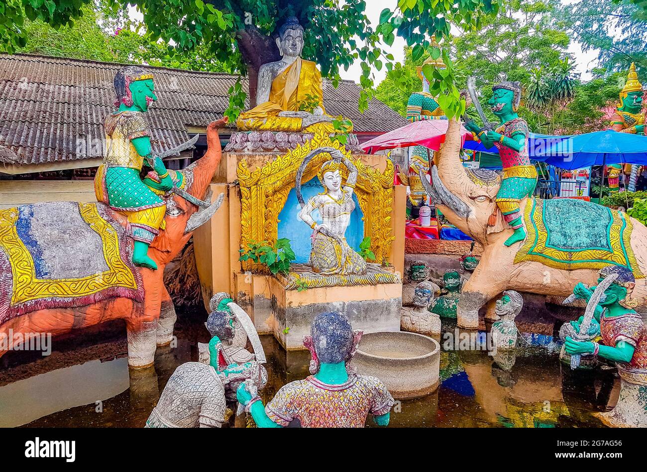 Phra Mae Thorani elephants and temple guardian Yaksha statues ...