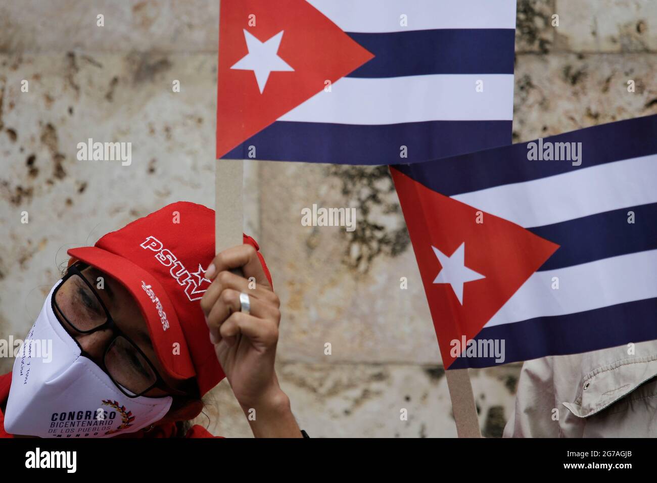 Caracas, Venezuela. 12th July, 2021. A woman wearing a PSUV cap and ...