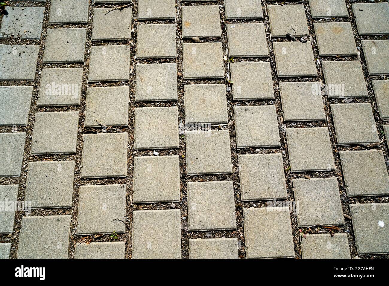 Structure of a stone as a pavement slab or as a brick Stock Photo - Alamy