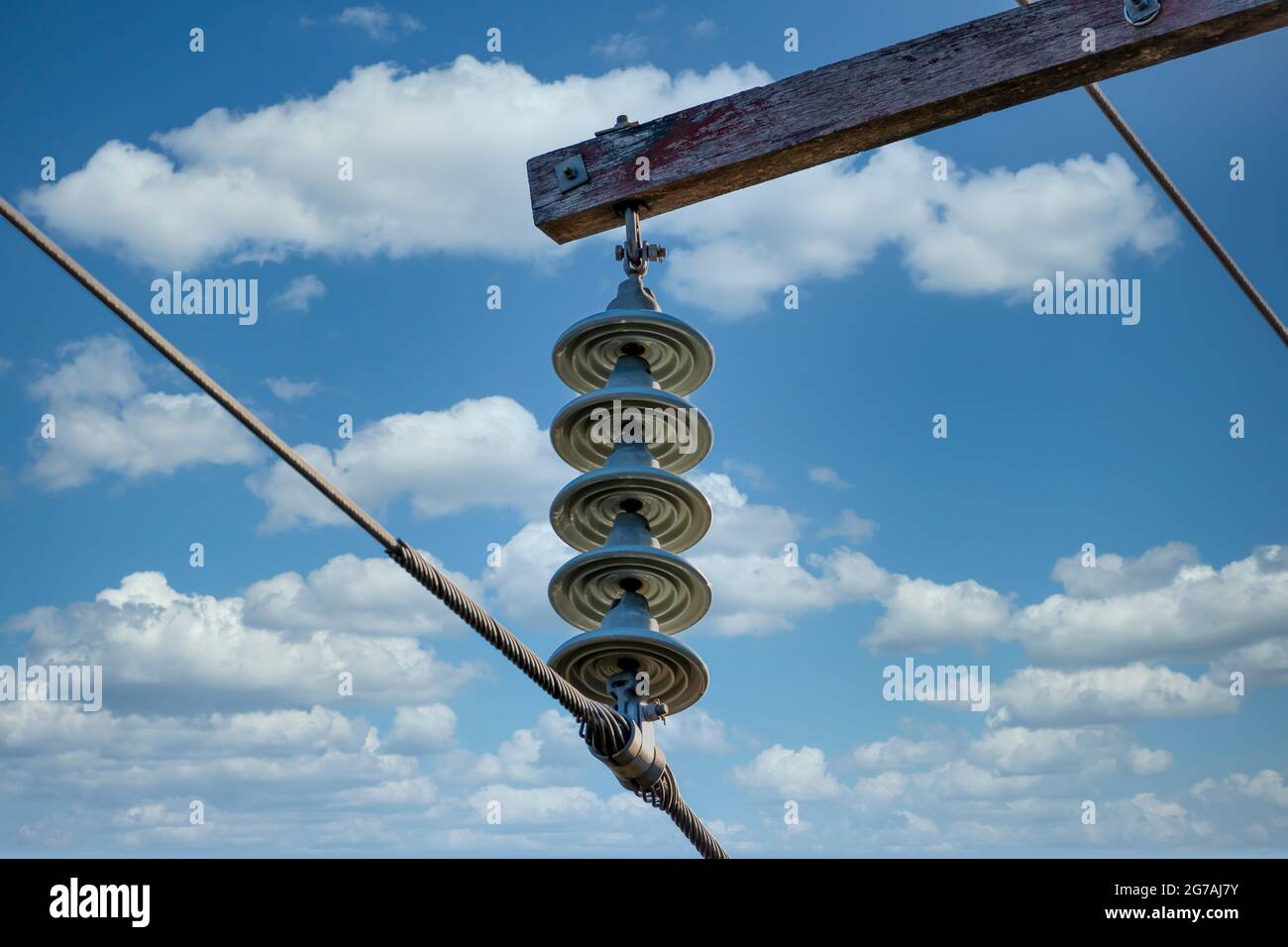 Photograph of a transmission line cable system connected to an assembly ...