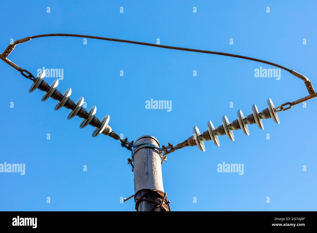 Photograph of a transmission line cable system connected to an assembly ...