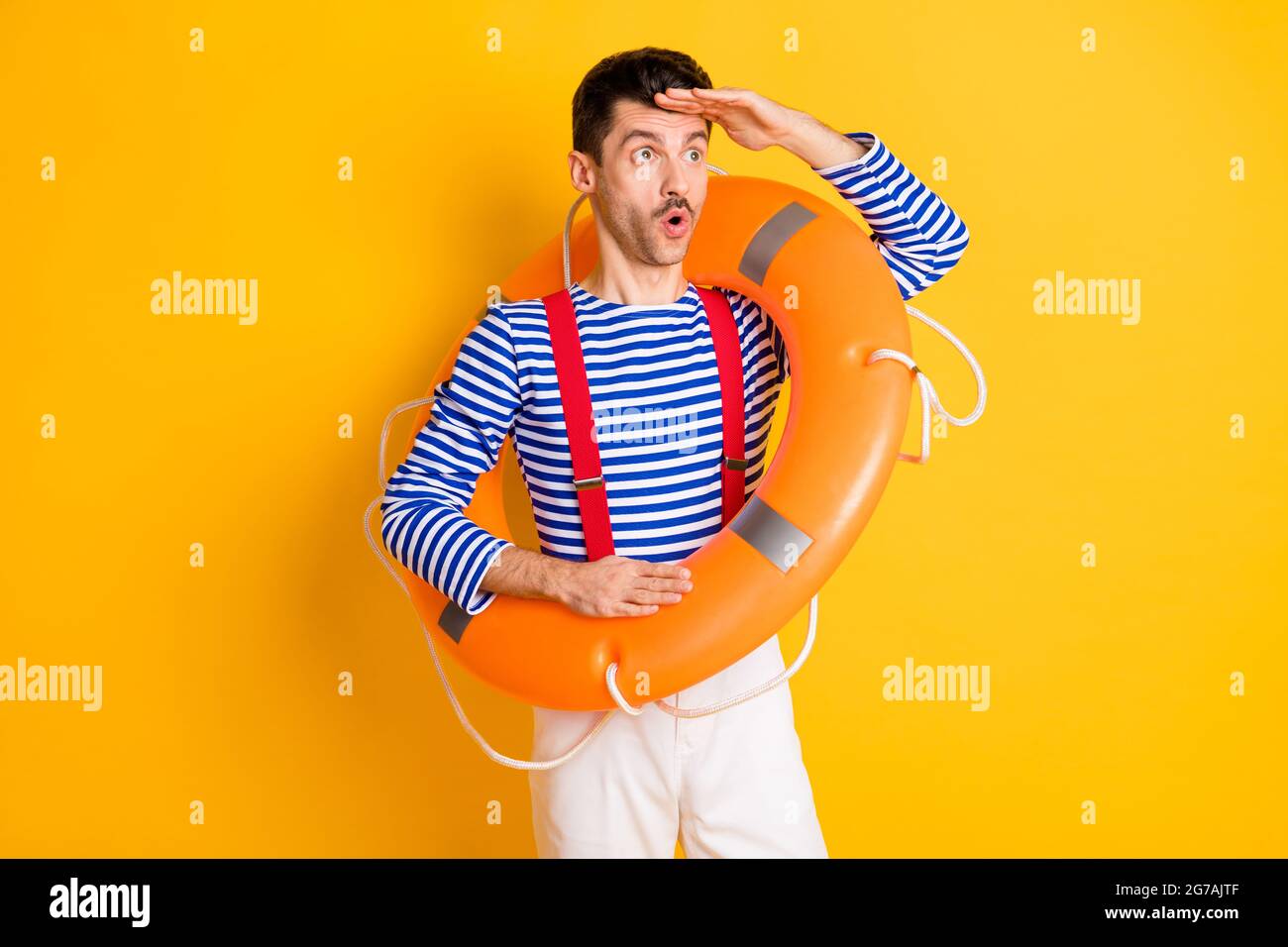 Full size photo of young amazed surprised man sailor look copyspace ...