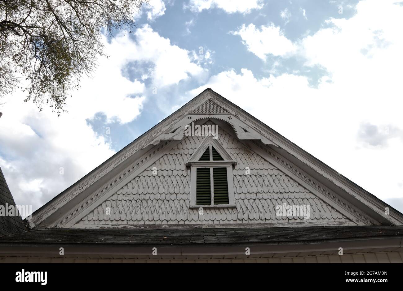 Vintage roof and window old retro 1950 style building and clouds with ...