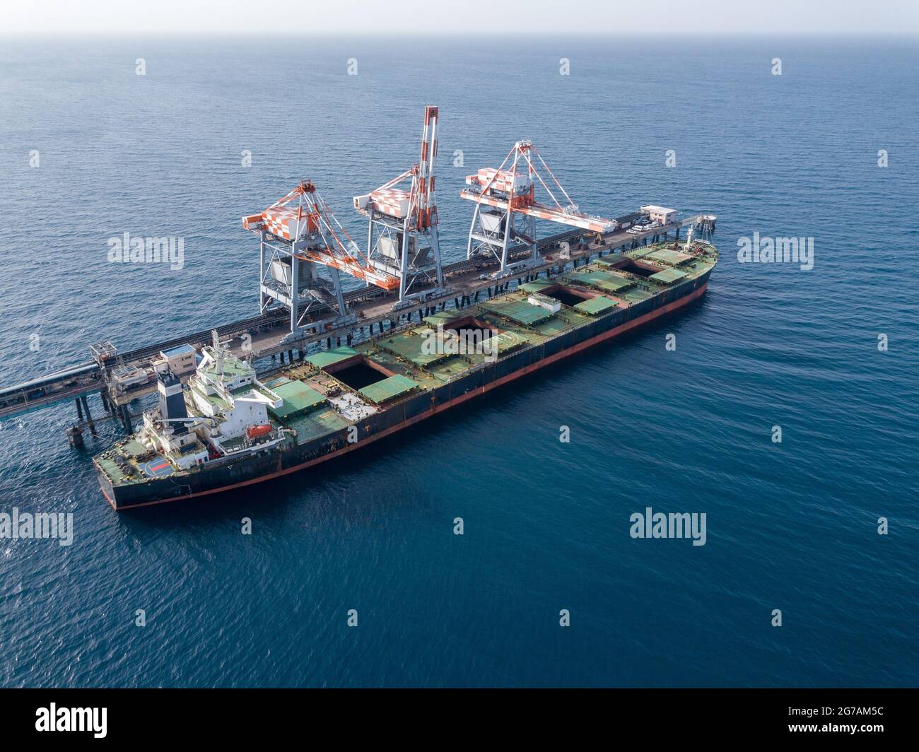 Bulk container ship unloads coal in the port of power station Stock ...
