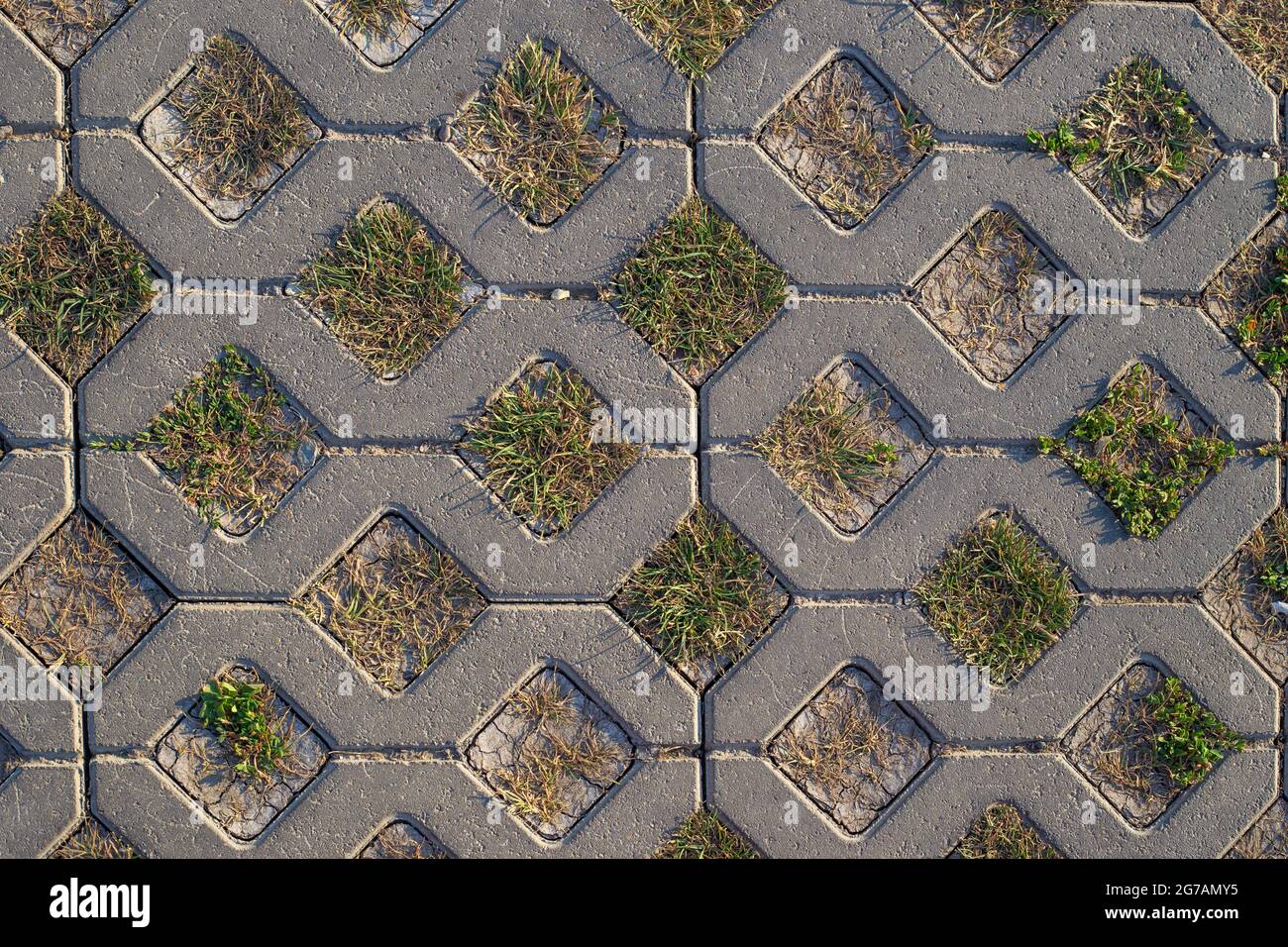 background of light paving stones in the form of rhombuses with ...