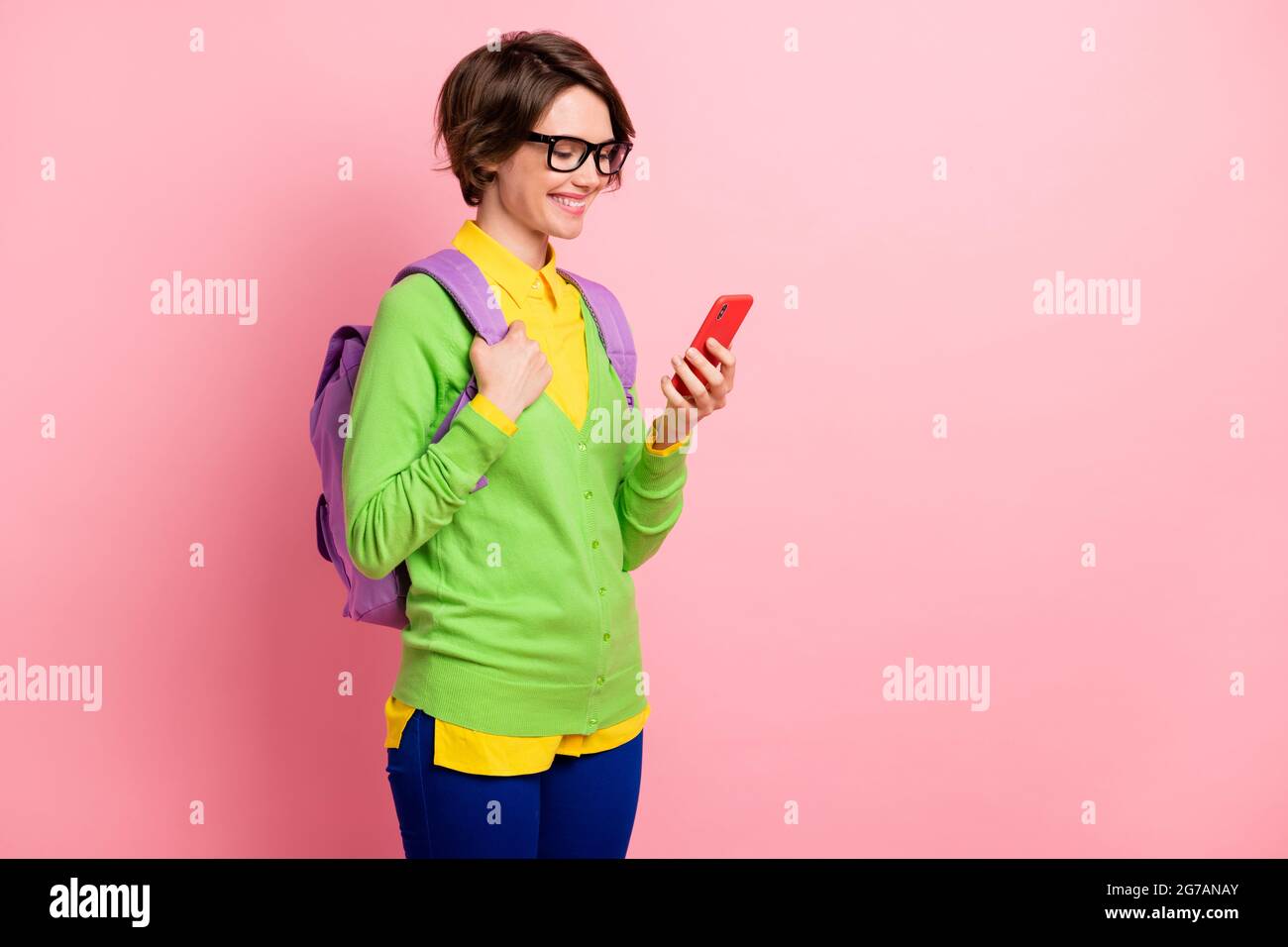 Photo of shiny woman wear green cardigan spectacles rucksack looking ...