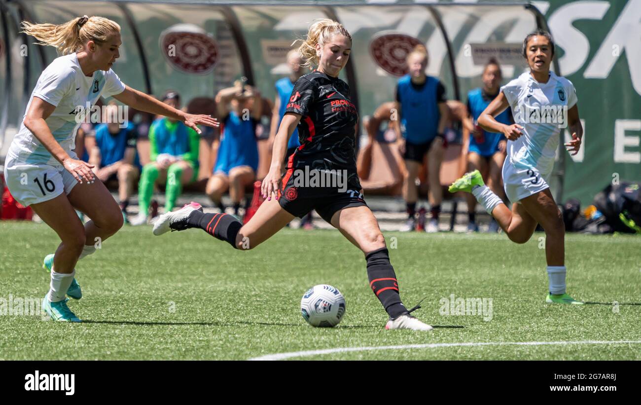 Portland, USA. 11th July, 2021. Thorns forward Morgan Weaver shoots ...