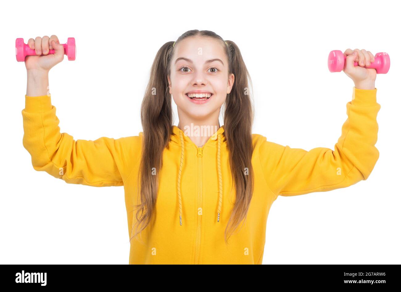 happy strong teen girl training with barbells isolated on white ...
