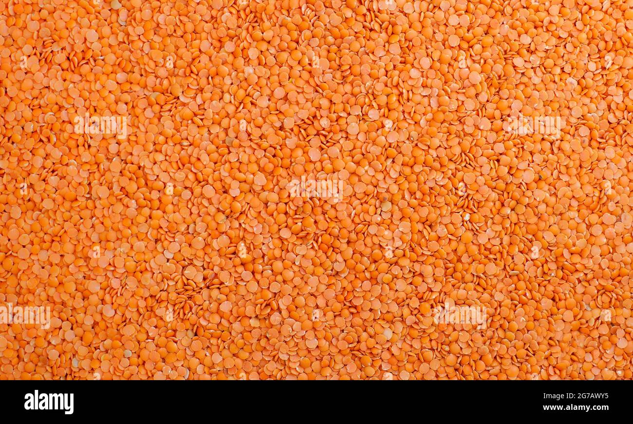 Raw seeds orange lentils hi-res stock photography and images - Alamy