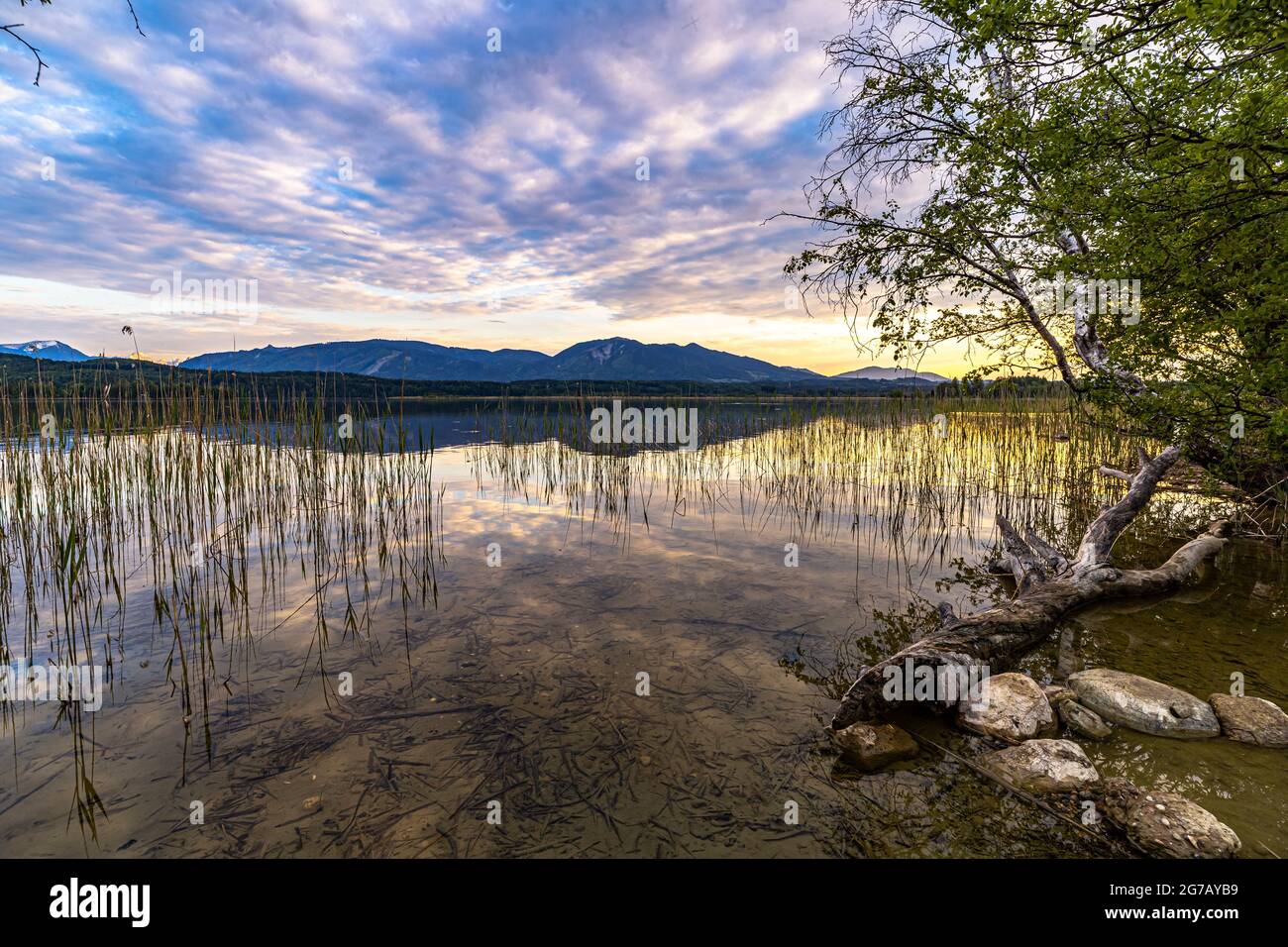 View over the water to the mountains at sunset at the moor areas at the ...