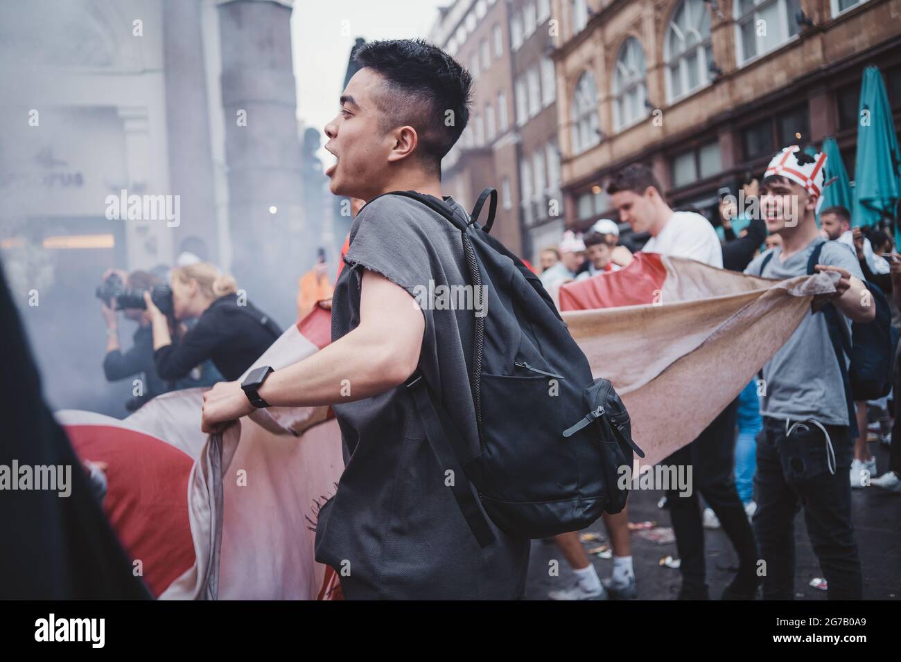 London | UK - 2021.07.12: English fans waving flags at Leicester Square ...