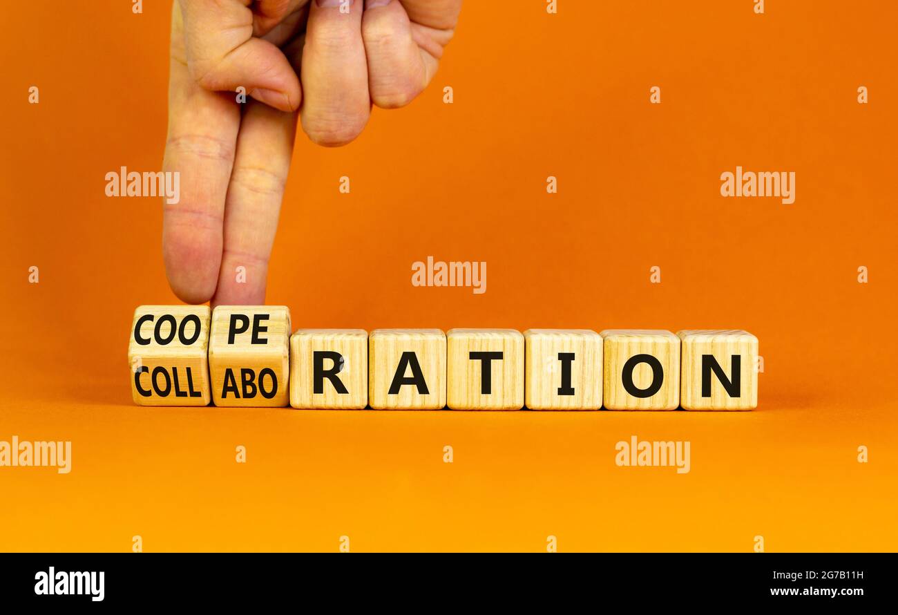 Cooperation or collaboration symbol. Businessman turns cubes, changes ...