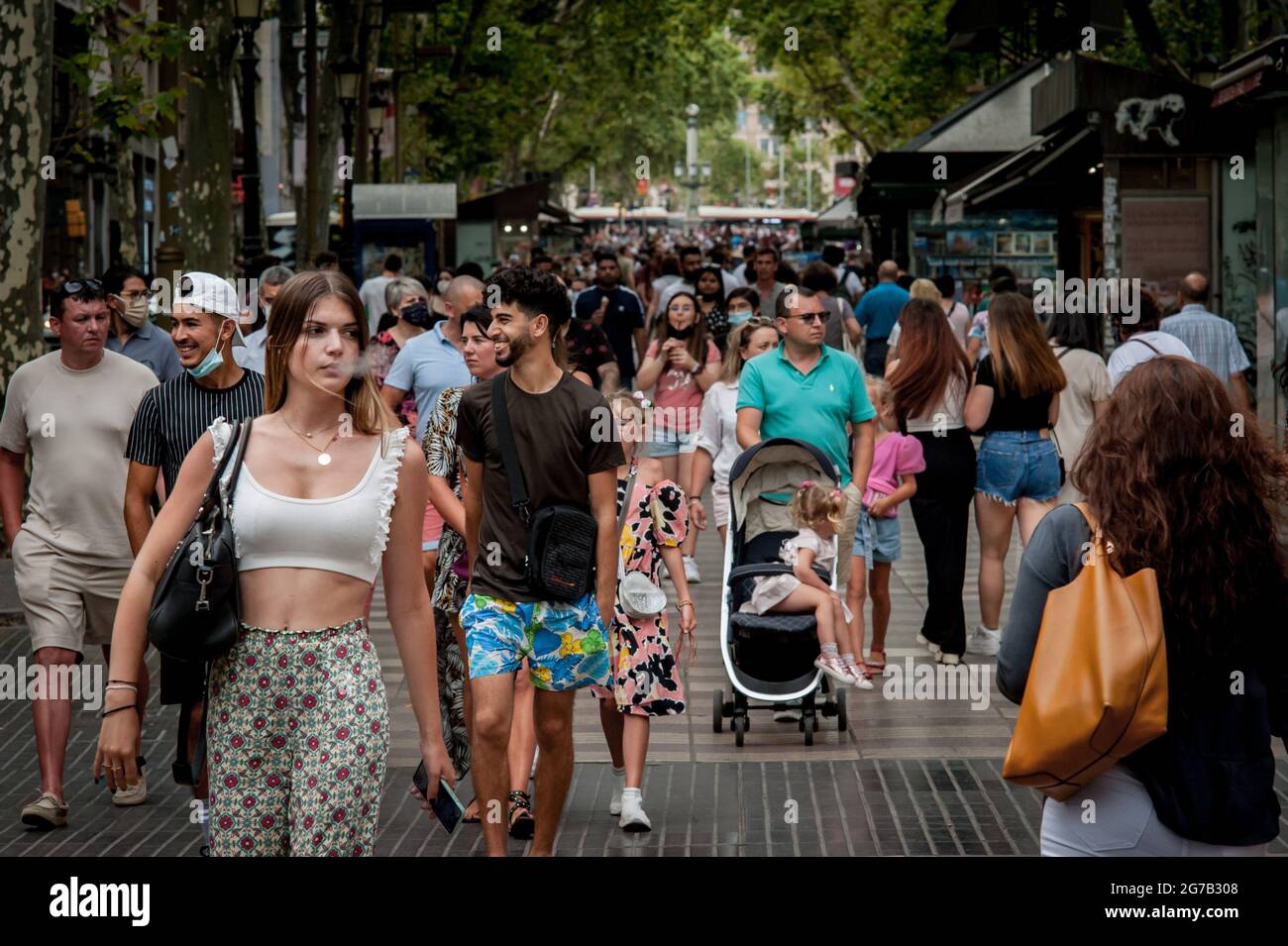 Barcelona, Spain. July 12, 2021, Barcelona, Spain: People, much of them ...