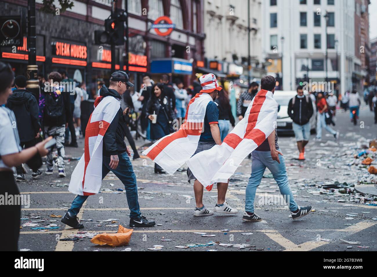 Football fans walking down road hi-res stock photography and images - Alamy