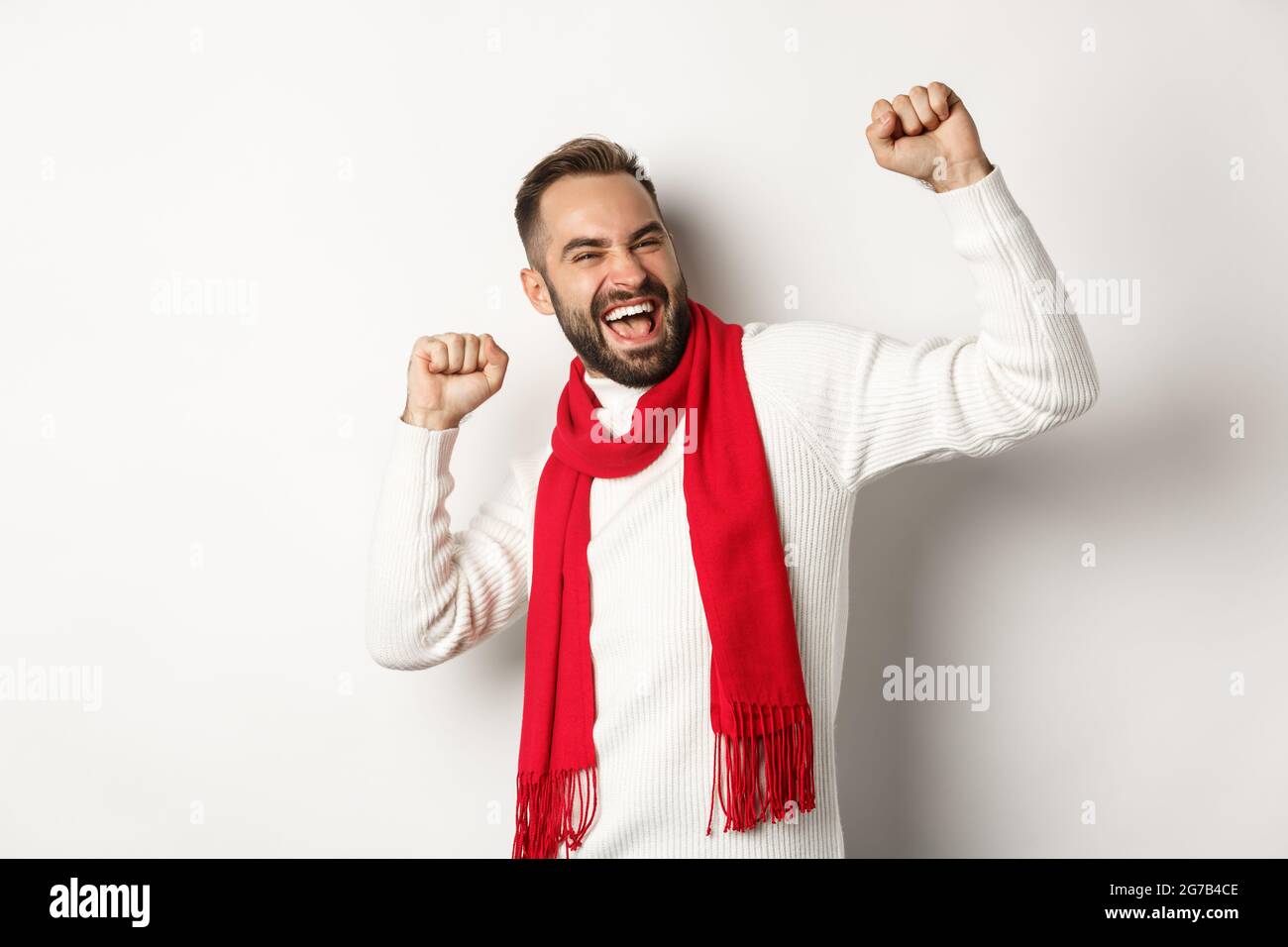 Happy bearded man celebrating christmas holidays on party, dancing and ...