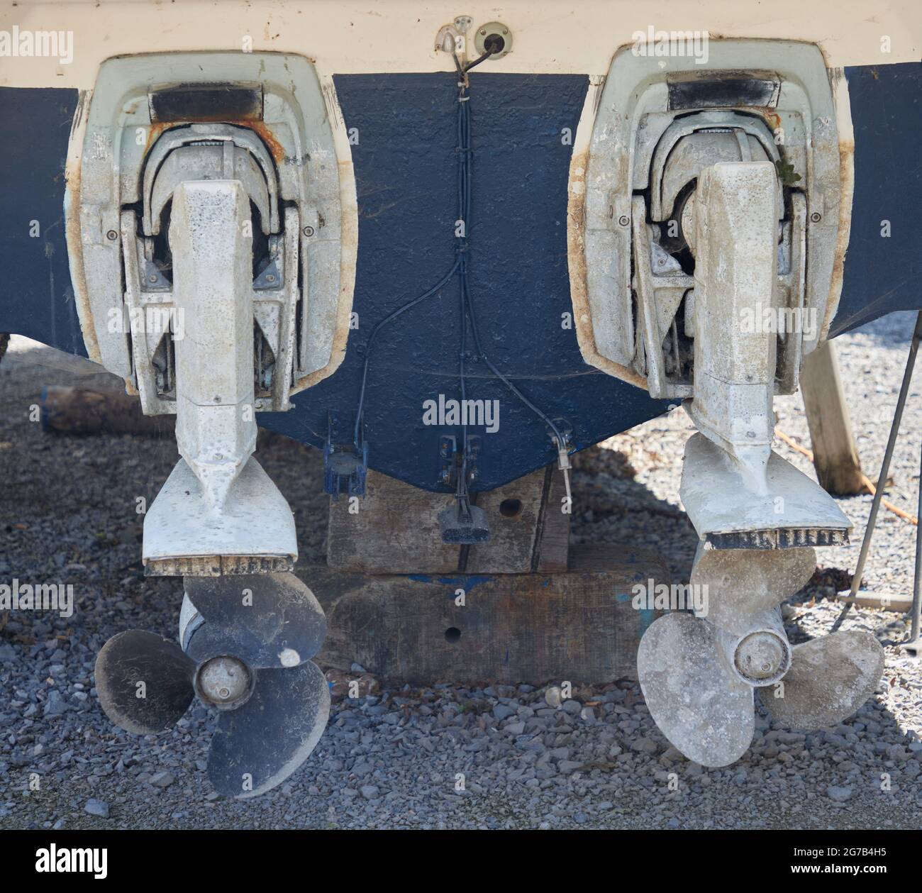 Twin motors with propellers outside a boat Stock Photo - Alamy