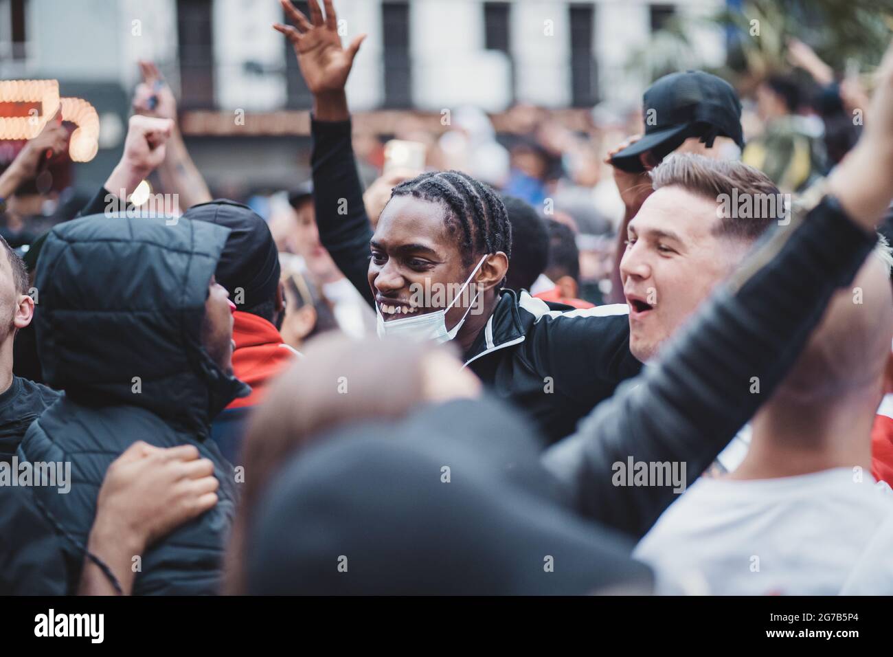 London | UK - 2021.07.12: English fans waving flags at Leicester Square ...