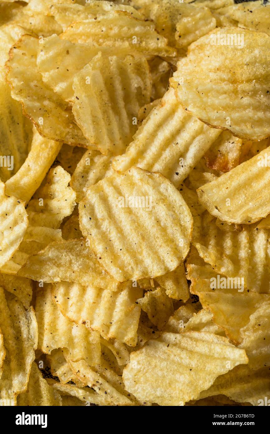 Fatty Ruffled Potato Chips Ready to Eat Stock Photo - Alamy