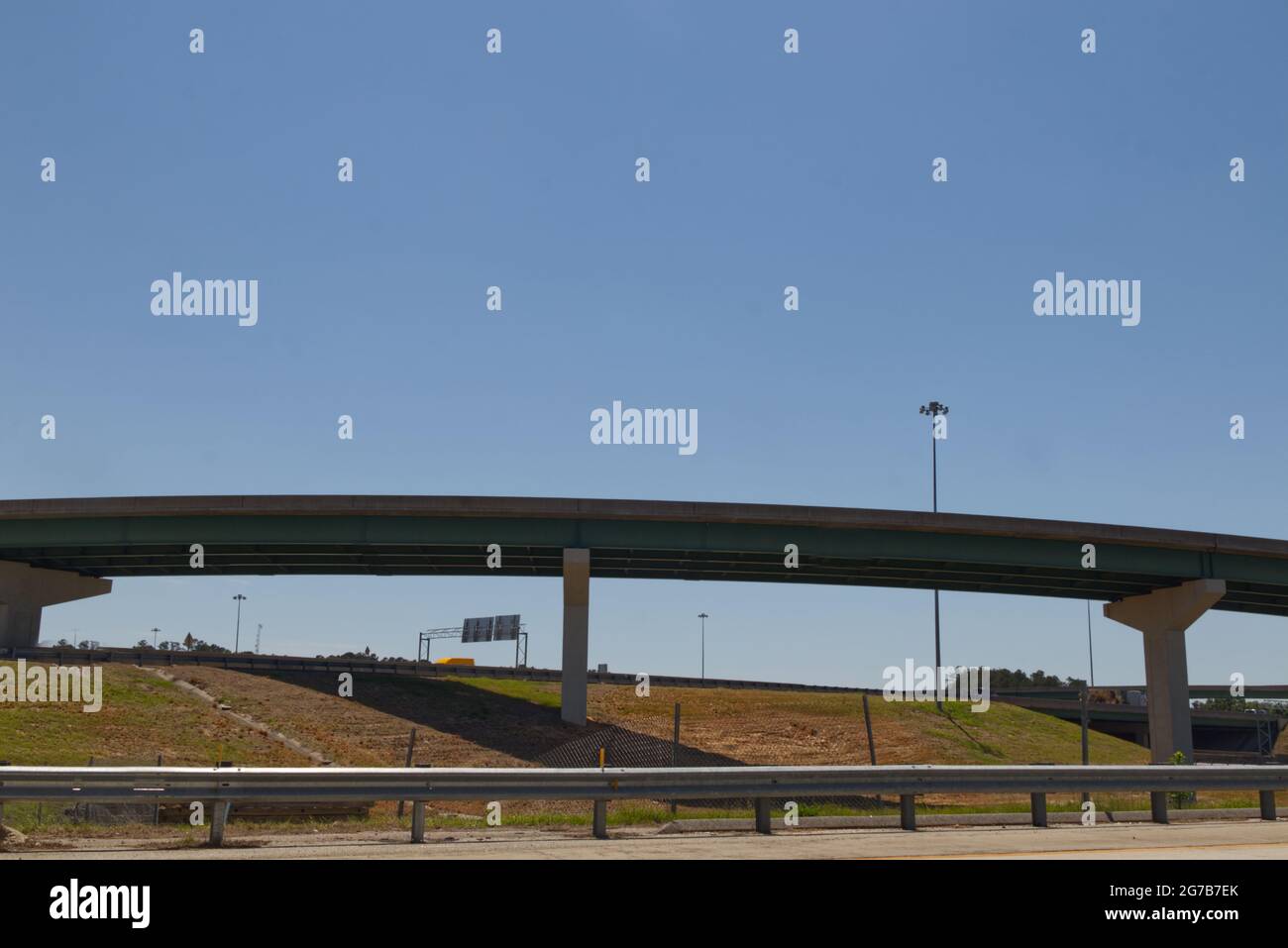 Clear blue sky modern highway bridge interchange - Bobby Jones ...