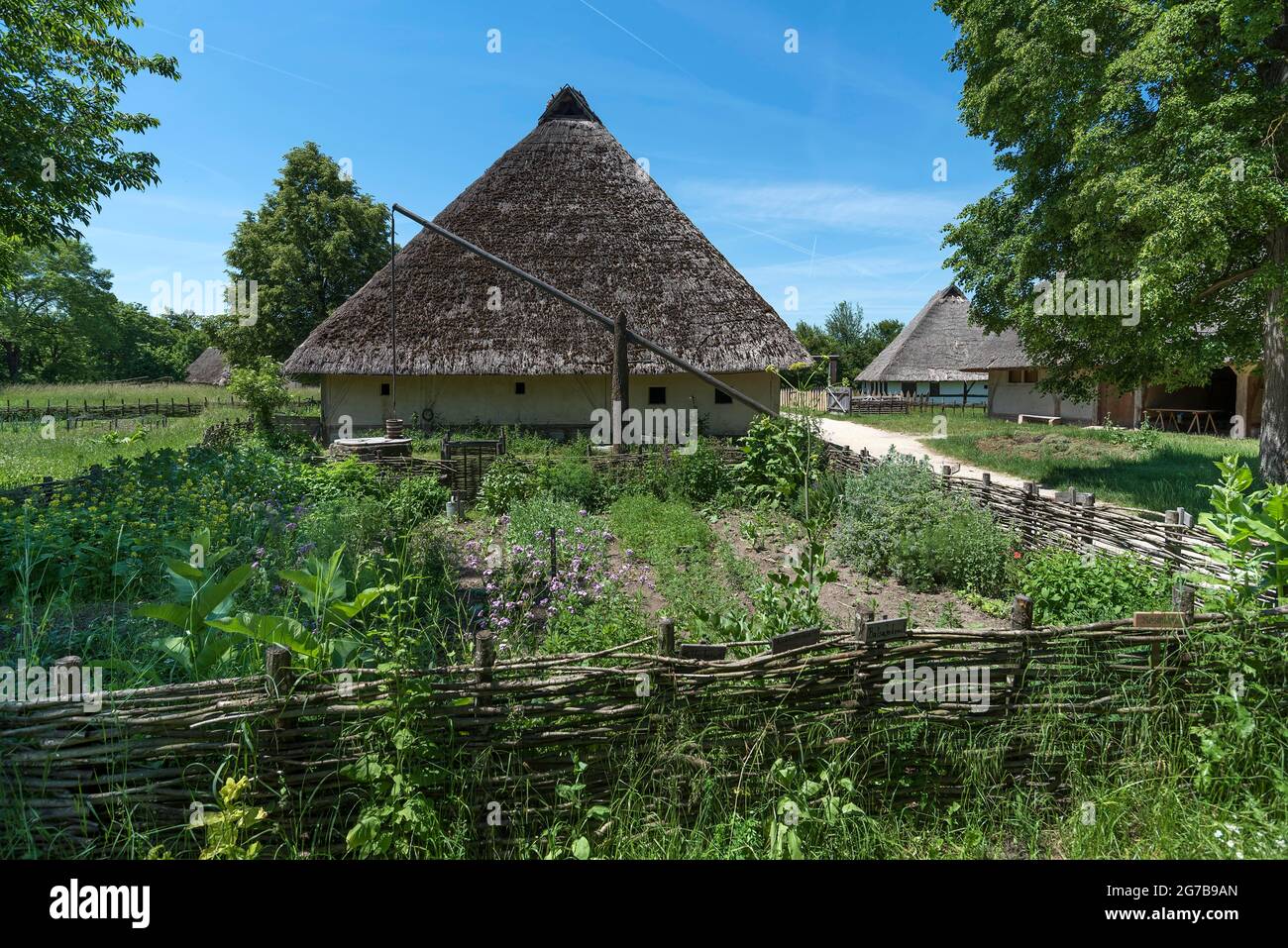 Farmhouse built around 1367, draw well in the farm garden, Franconian ...