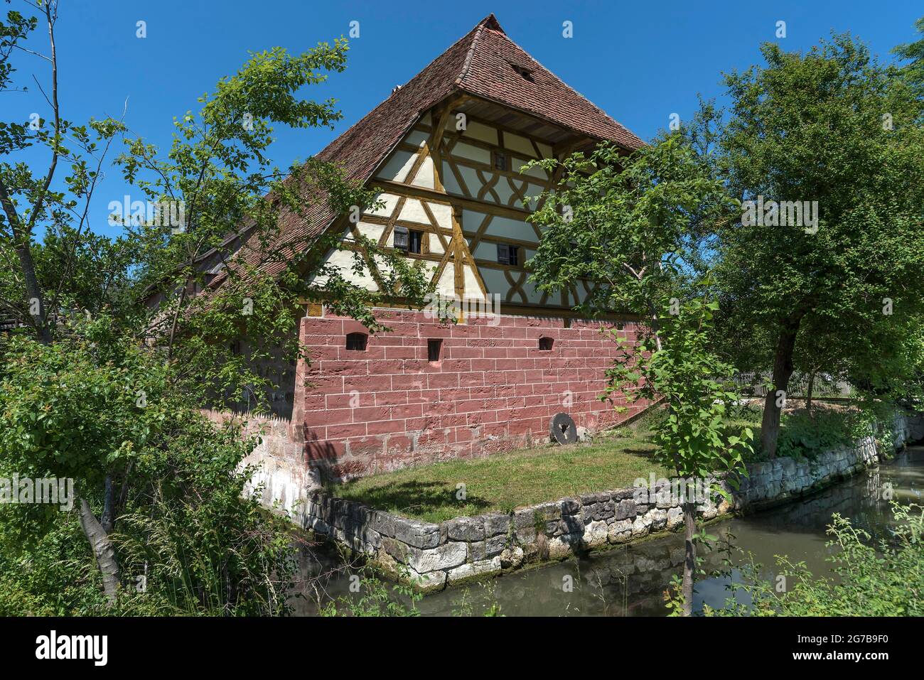 Grain mill built 1575, extended 1601, in front the mill stream ...