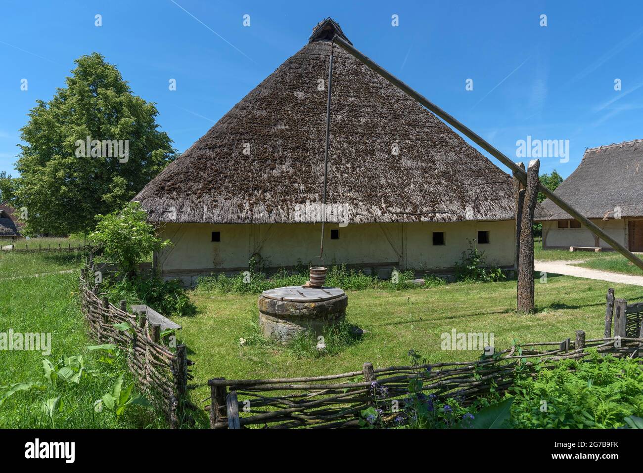 Farmhouse built around 1367, draw well in the farm garden, Franconian ...